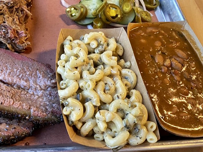 Mac and cheese elevated to side dish royalty, proving comfort food deserves serious respect.