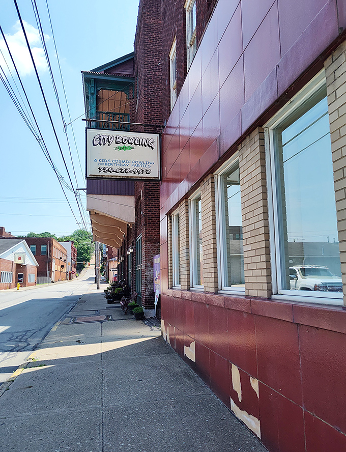 City Bowling's vintage sign promises the satisfying crack of pins and squeaky rental shoes&mdash;some experiences technology simply can't improve.