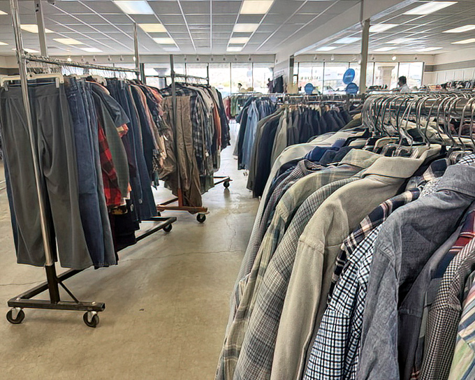 The clothing department stretches toward the horizon, a textile sea where fashion from every decade waits to be rediscovered and reimagined.