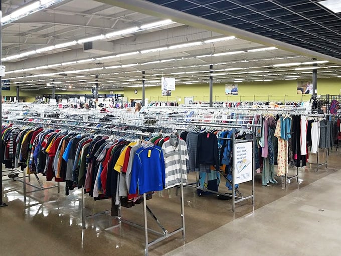 The clothing section stretches toward the horizon, a rainbow of fabrics organized with surprising precision for maximum treasure-hunting efficiency.