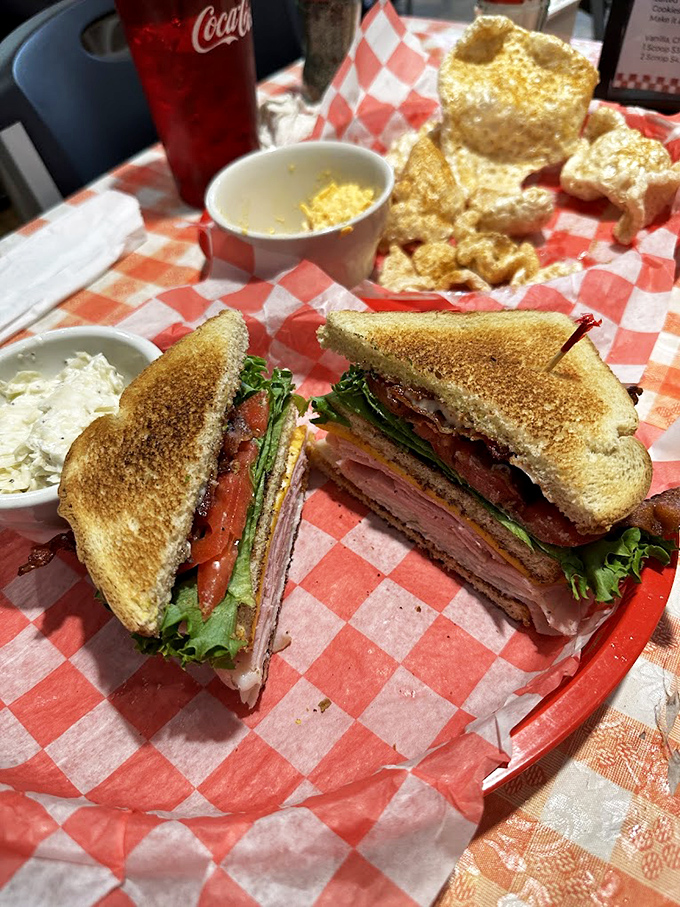 The club sandwich&mdash;architecture you can eat. Layers of meat, cheese, and veggies stacked between perfectly toasted bread, proving simplicity can be spectacular.