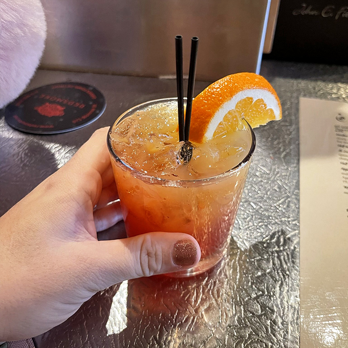 This isn't just a cocktail&mdash;it's a vacation in a glass, complete with an orange slice beach and two straws for snorkeling.