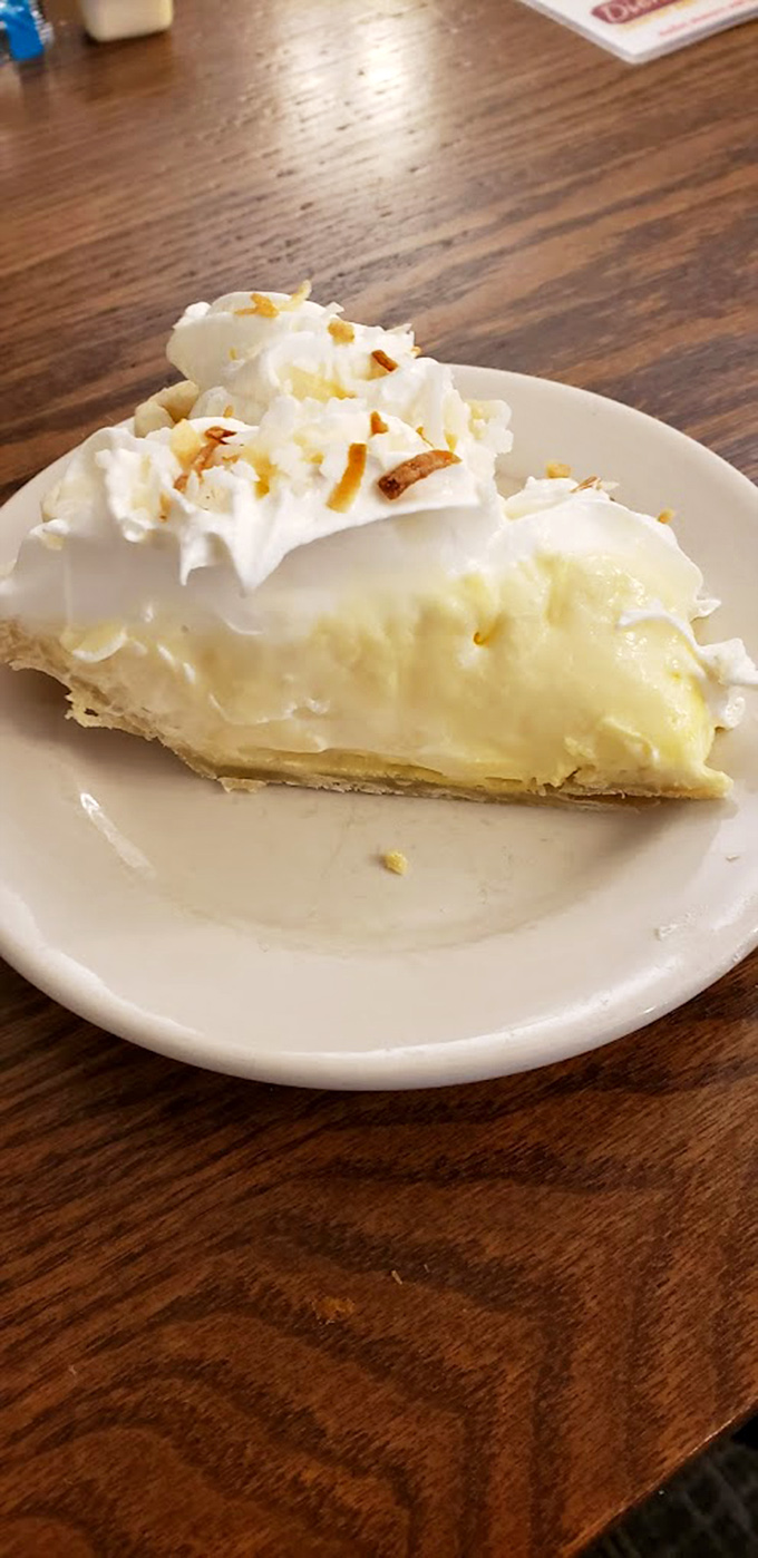 Coconut cream pie that would make your grandmother jealous. Those toasted coconut flakes on top are like little crunchy halos.