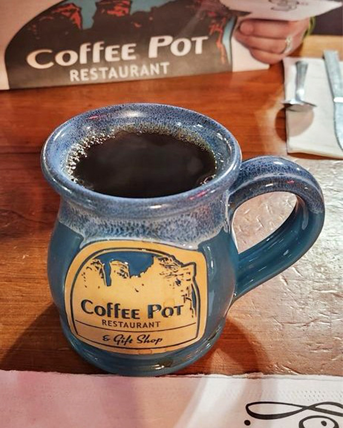 The mug that launched a thousand adventures. This signature blue pottery vessel delivers liquid motivation with Sedona style.