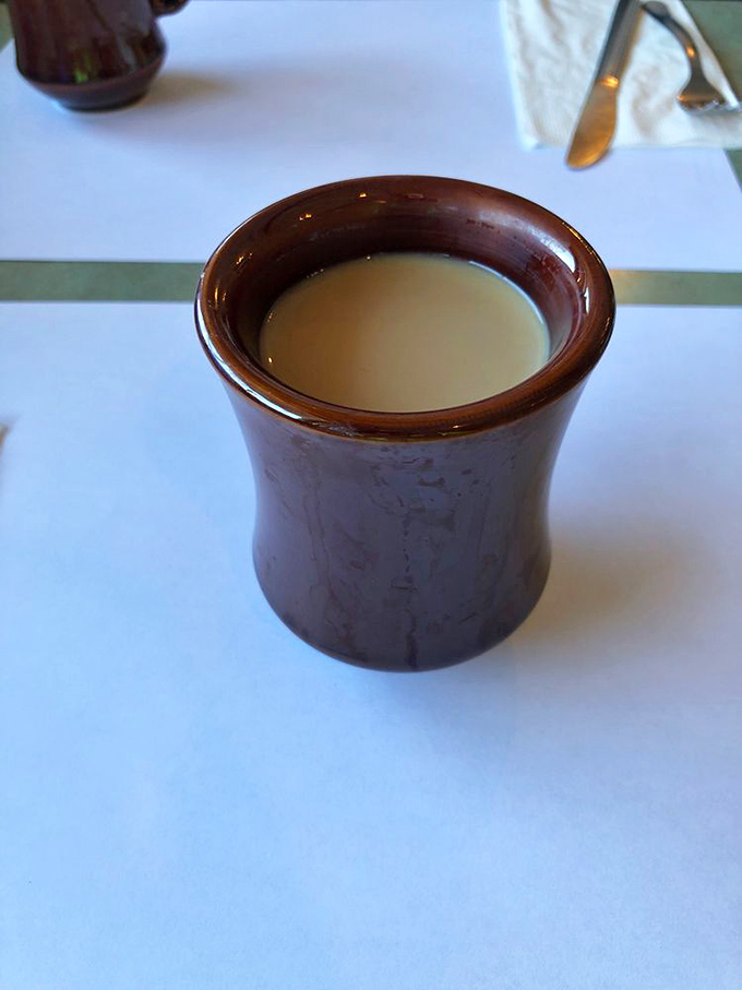 The coffee comes in a sturdy mug that means business&mdash;no pretentious vessels here. This is the kind of honest brew that fuels Tampa's morning conversations.