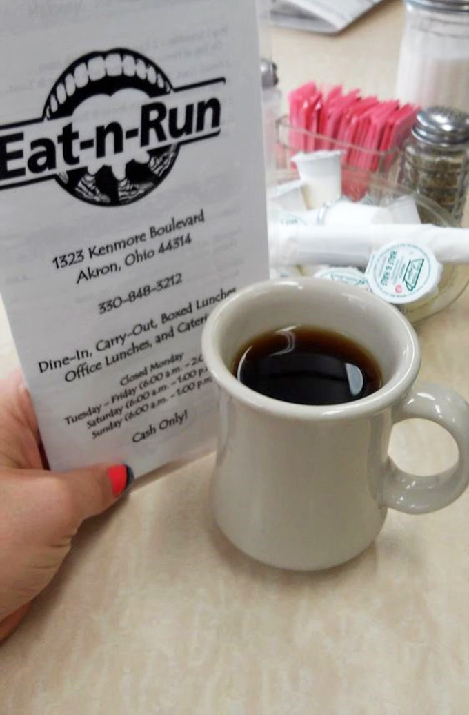 That classic diner mug doesn't just hold coffee&mdash;it holds the promise of a day that might actually turn out okay. Note the pink sweetener packets standing by.