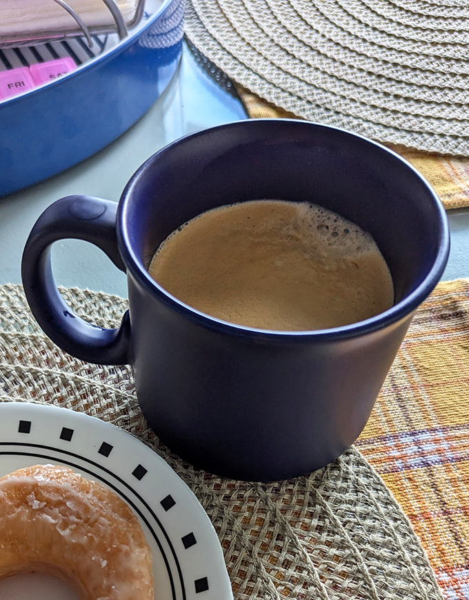 The perfect companion to fried dough&mdash;a steaming cup of coffee in a no-nonsense mug. Some relationships are simply meant to be.