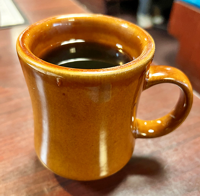 The humble coffee mug&mdash;keeper of morning salvation, warm to the touch, bottomless by local diner law. 