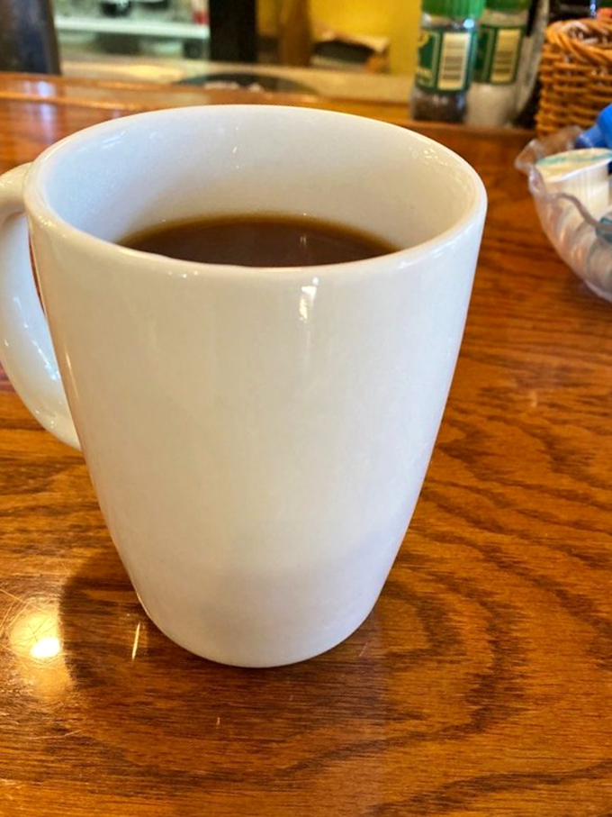 The humble coffee mug&mdash;vessel of morning salvation. At Leo's, they understand that prompt refills are not just good service but a moral obligation.