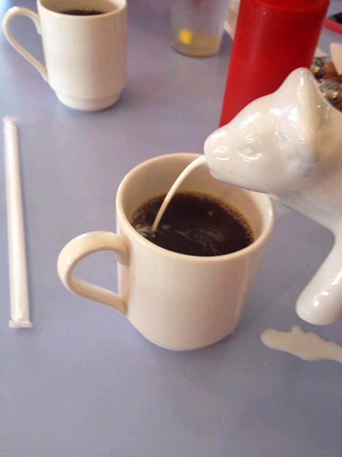 Fresh coffee served in classic white mugs, because some things are too good to mess with.