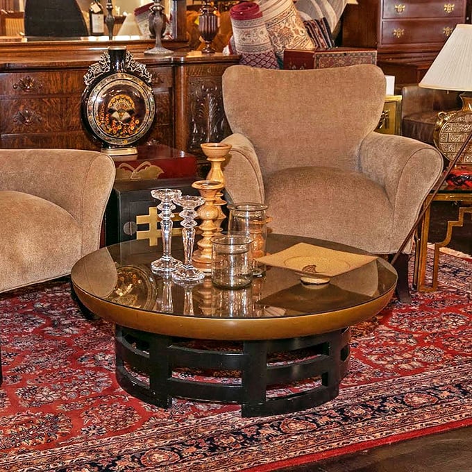 This isn't just a coffee table&mdash;it's a stage where crystal candlesticks and vintage treasures perform their daily show for appreciative audiences.