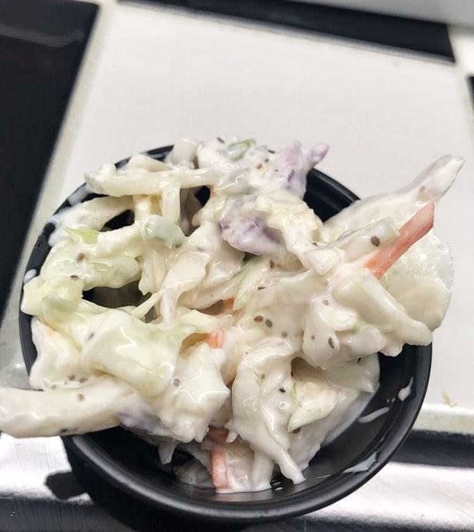 Coleslaw that doesn't know it's a side dish – creamy, crunchy, and confident enough to steal the spotlight from any sandwich.