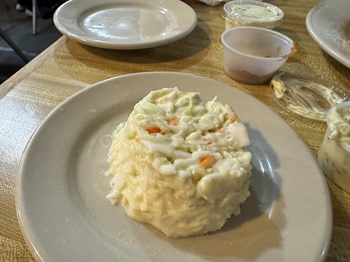 This isn't just coleslaw&mdash;it's the cool, creamy counterpoint that brings balance to the universe of fried delights on your plate.