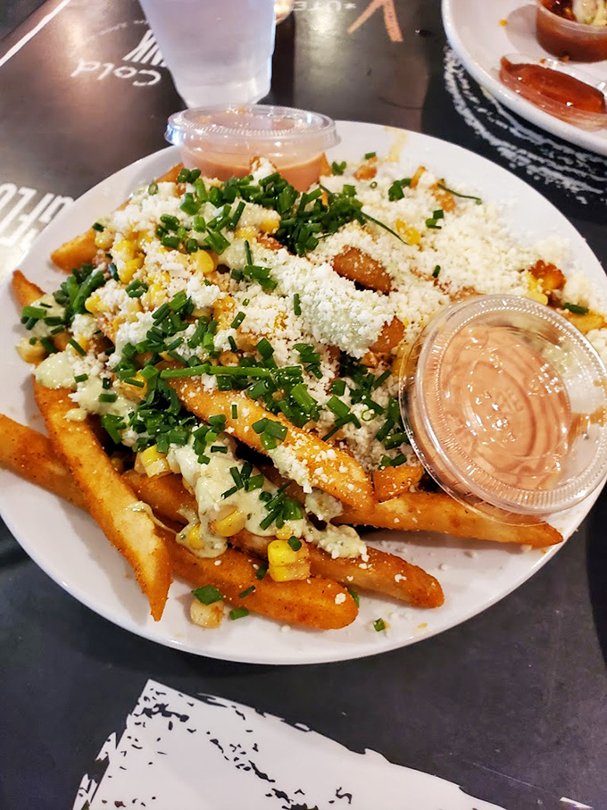 Elote fries&mdash;where street corn meets French fries and creates the side dish equivalent of finding money in your old jacket pocket.
