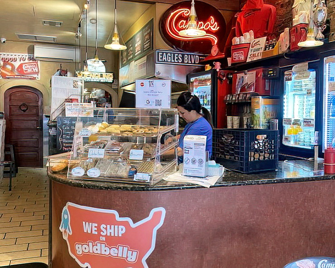 Behind the counter where sandwich magic happens, Campo's staff orchestrates the daily symphony of slicing, grilling, and assembling Philadelphia's beloved handheld feasts.
