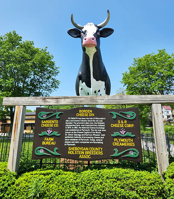 The informational plaque tells Plymouth's cheese story, but Antoinette's imposing presence speaks volumes without saying a word. History towers above you here.