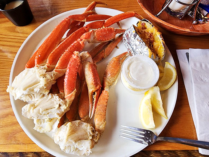 Snow crab legs splayed like a crustacean sunburst. The kind of dish that transforms civilized diners into happy, butter-drenched cavemen.