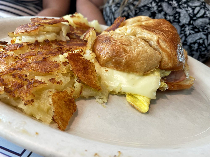Breakfast alchemy: golden hash browns and a croissant sandwich that makes you wonder why you'd ever settle for drive-thru breakfast again.