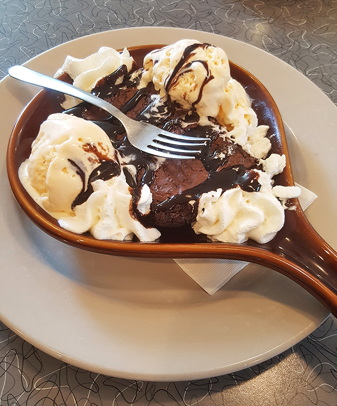 A brownie sundae that understands the importance of ice cream-to-brownie ratio. This is dessert democracy at its finest.