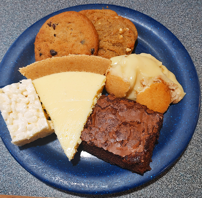 The dessert sampler that ruins diets and creates memories. That cheesecake slice is practically winking at you.