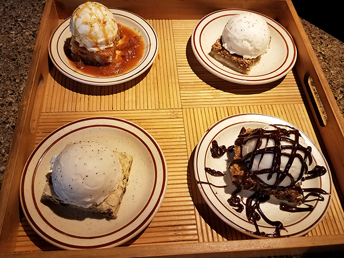 Dessert flight heaven! Four sweet finales topped with ice cream, because choosing just one would be an unnecessary act of self-denial.