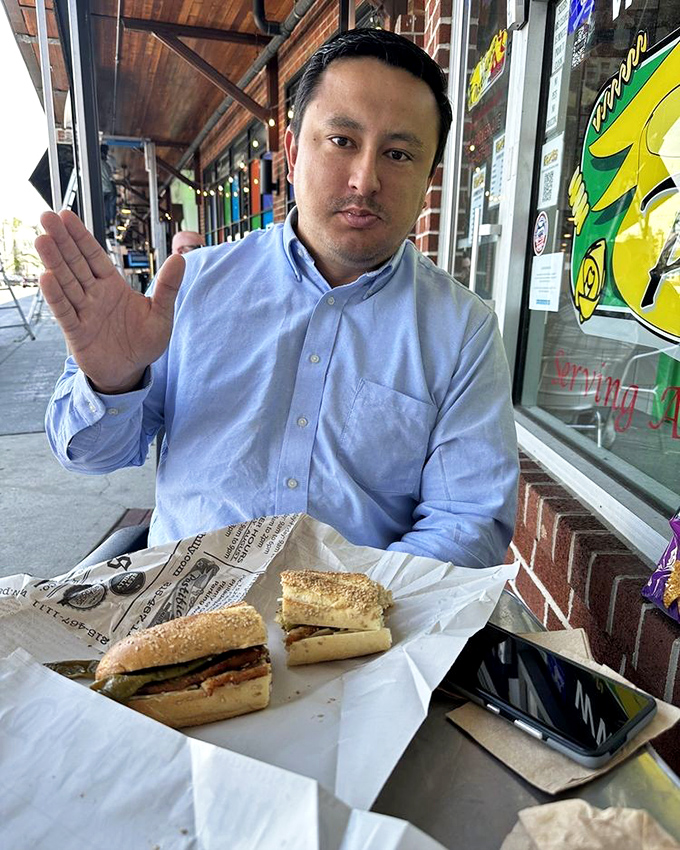Sidewalk dining at its finest. That look says, "I've found something special and I'm not entirely sure I should be sharing this secret."