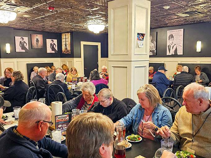 The dining room buzzes with the energy of folks who know they've found something special. Multi-generational tables sharing stories and pasta&mdash;the true Italian way.