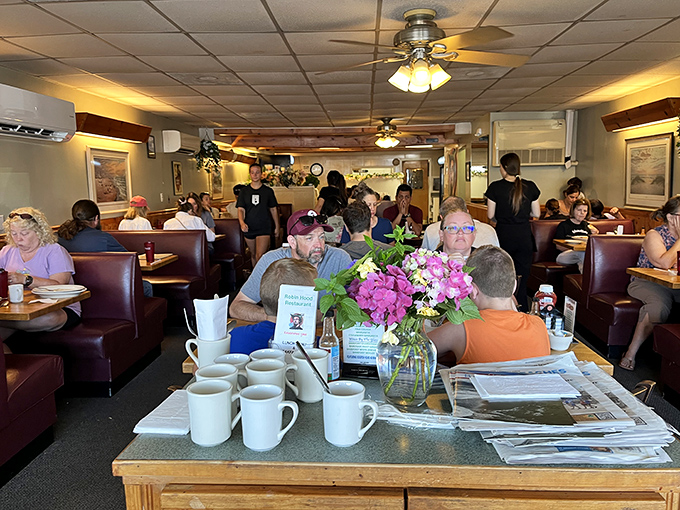 Where locals and tourists break bread together. The bustling dining room hums with conversation while coffee mugs are magically refilled before they're empty.