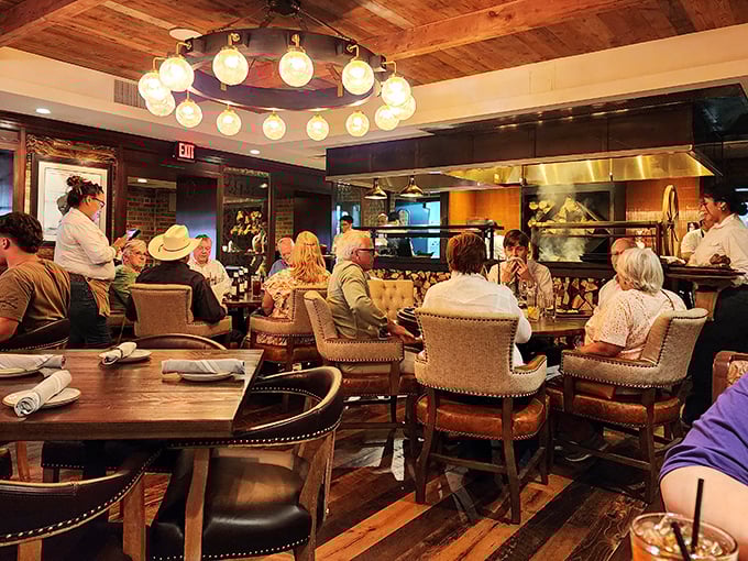 Where strangers become friends over medium-rare conversations. The dining room hums with the symphony of satisfaction.