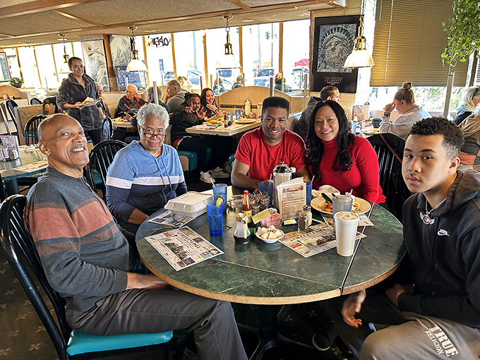Three generations sharing breakfast and stories – the true magic of diners happens between bites and across the table.