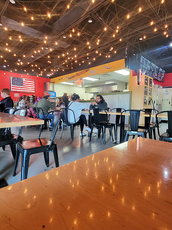 The dining room buzzes with the universal language of barbecue appreciation &ndash; the nodding heads and momentary silences that signal culinary bliss.