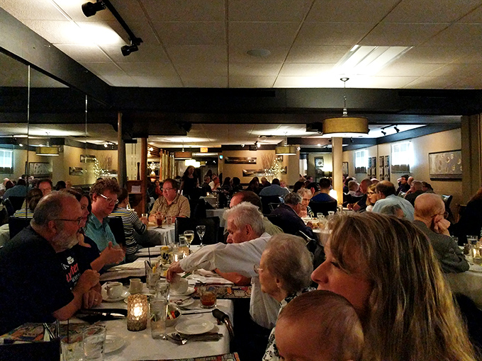 Friday nights at The Packing House look like this: full tables, happy diners, and the symphony of satisfied conversation.