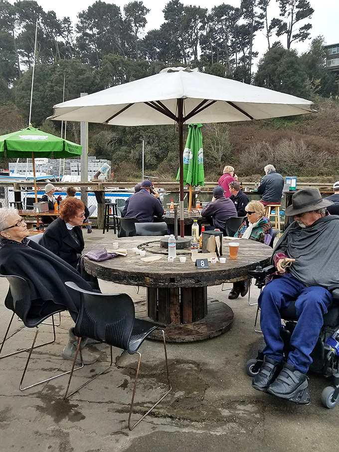 The outdoor dining area&mdash;where strangers become friends over shared appreciation of fried seafood and harbor views.
