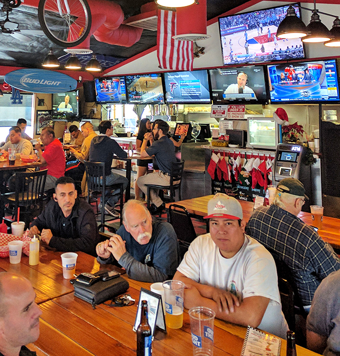 Where locals gather to debate sports, politics, and the serious business of whether to order dessert after demolishing a burger.