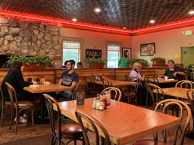 The dining room hums with the universal language of "mmm" as strangers become temporary family united by good food.