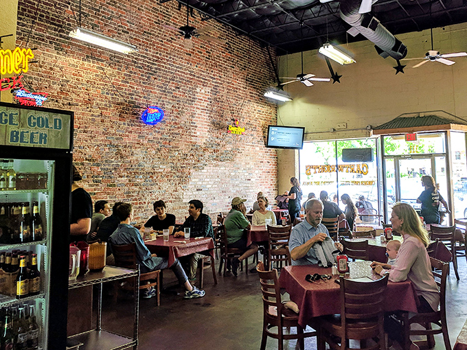 The exposed brick walls and vintage neon signs create that perfect "I've discovered something special" atmosphere that makes regulars out of first-timers.