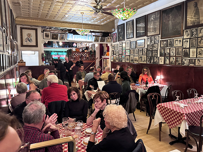 The dining room buzzes with conversation and anticipation &ndash; everyone knows when that bell rings, forks pause and opera begins.