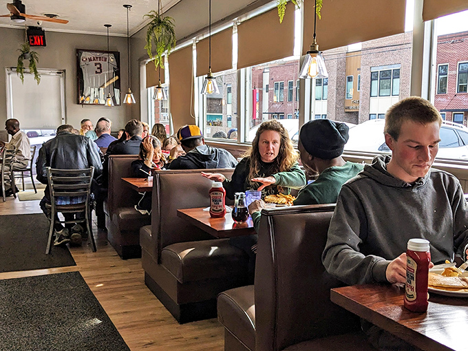 The dining room hums with conversation and clinking silverware, a democratic space where everyone from construction workers to retirees breaks bread together.