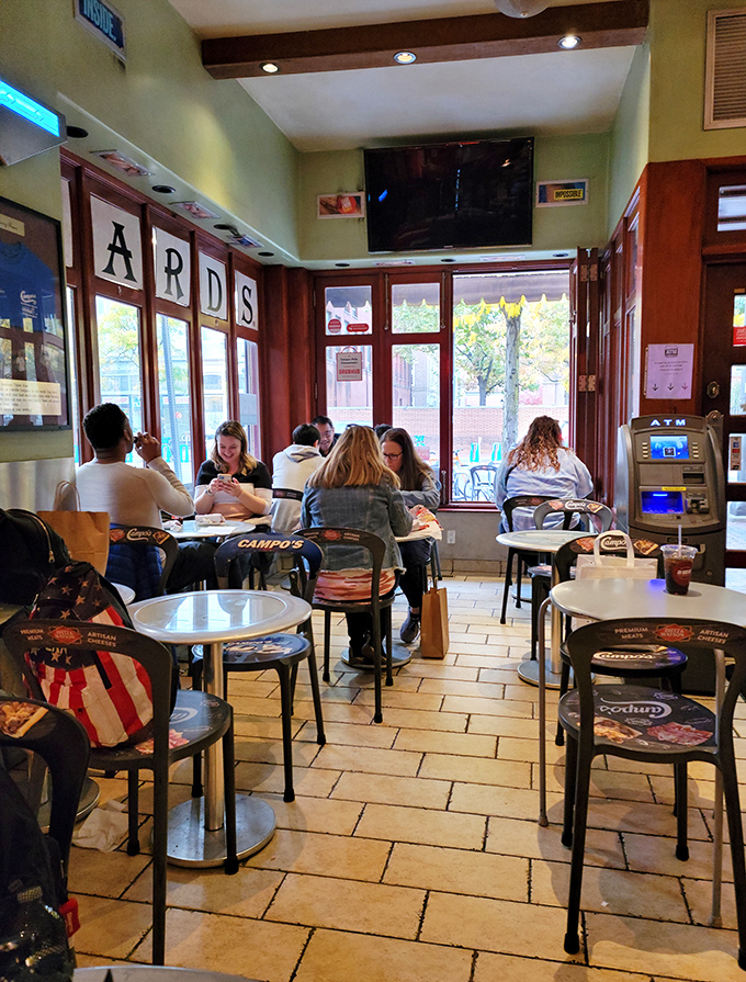 The dining room at Campo's: where strangers become friends united by the universal language of "mmm" and "pass the napkins, please."