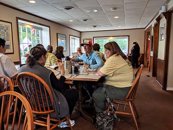 The dining room hums with the symphony of forks against plates and genuine conversation. No Instagram posing&mdash;just people actually enjoying their food.