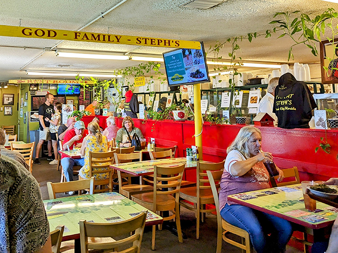 The dining room buzzes with the energy of people united in pursuit of exceptional comfort food. Notice how nobody's looking at their phones—the food commands full attention.