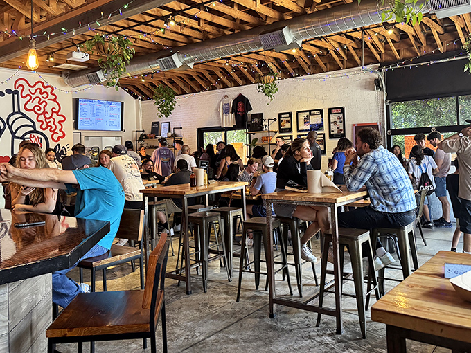 Community tables filled with strangers united by the universal language of "mmm" and "pass the napkins, please."