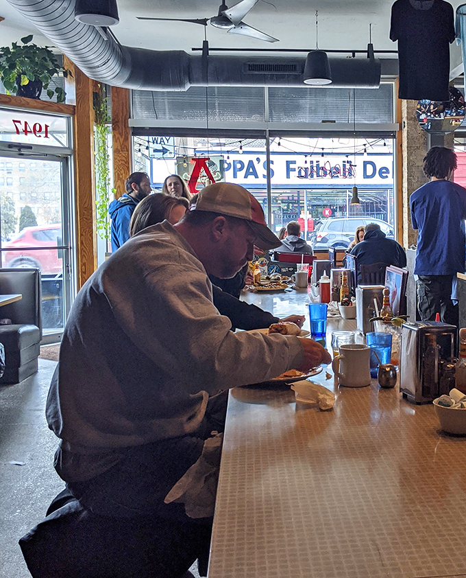 The counter seating offers front-row views to Milwaukee's favorite spectator sport: watching other people's food arrive while waiting for yours.