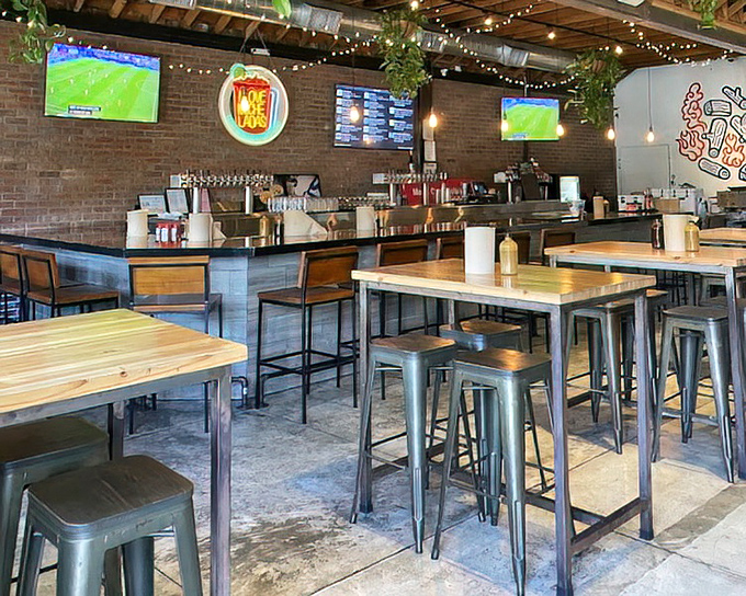 Where barbecue magic happens. High ceilings, wooden tables, and the anticipation of meat that's been smoking longer than some relationships last.