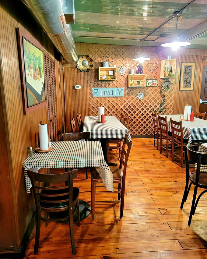 Wooden lattice, family signs, and simple tables create an atmosphere where calories don't count and conversations flow as freely as the sweet tea.