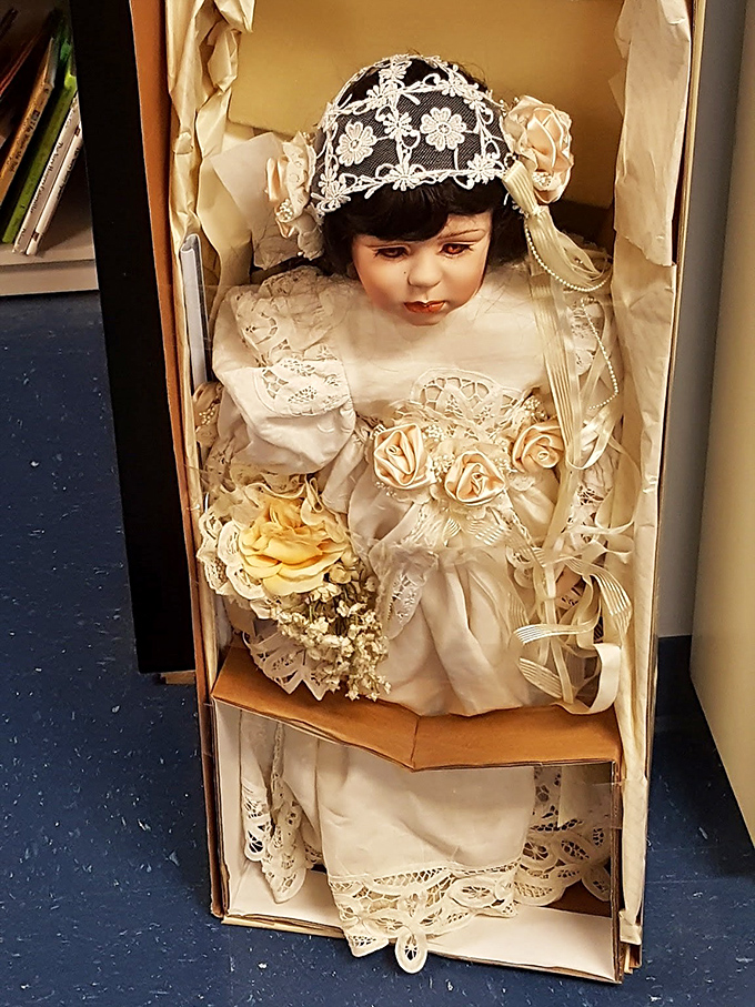 This vintage bride doll, equal parts charming and slightly unnerving, has been waiting decades for someone brave enough to take her home.