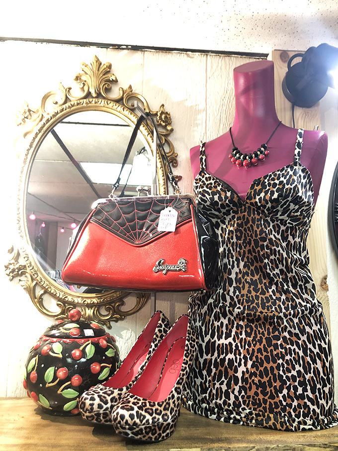 This leopard-print slip dress and spiderweb purse combo screams "I could be going to a fancy dinner or summoning spirits—or both!" Versatility at its finest.