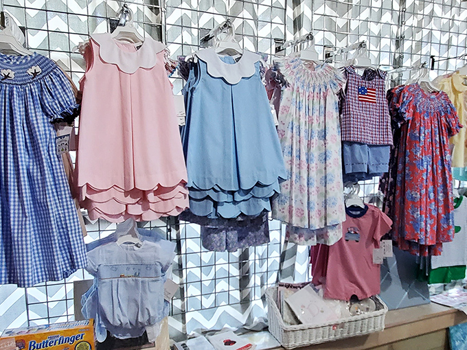 Sweet scalloped collars and classic patterns &ndash; these children's dresses hang like tiny time capsules of an era when "Sunday best" meant something special.