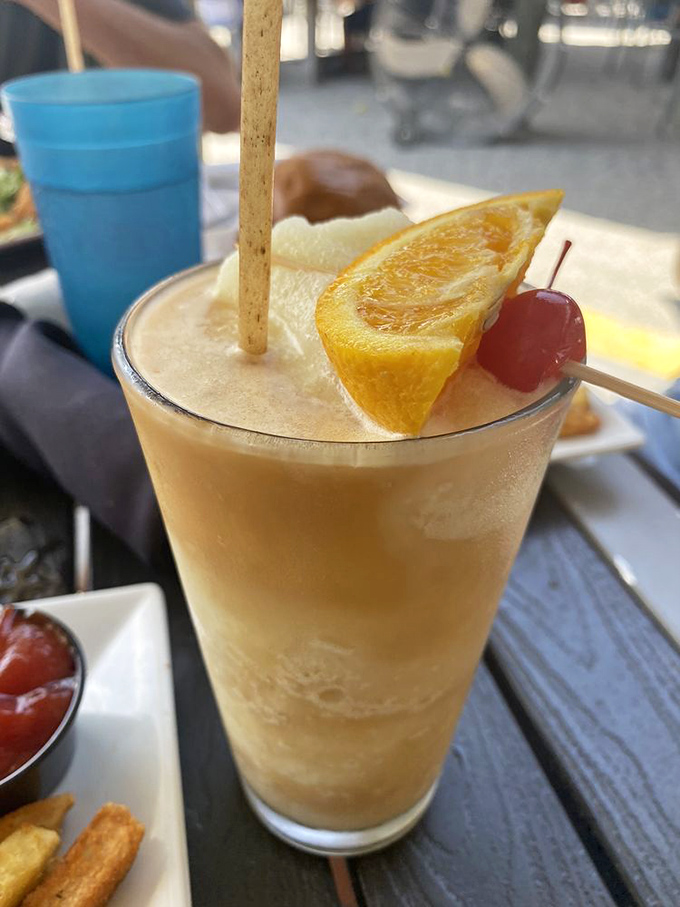 This isn't just a frozen drink&mdash;it's Florida in a glass, complete with a sunset-colored orange slice and the promise of temporary amnesia for work emails.