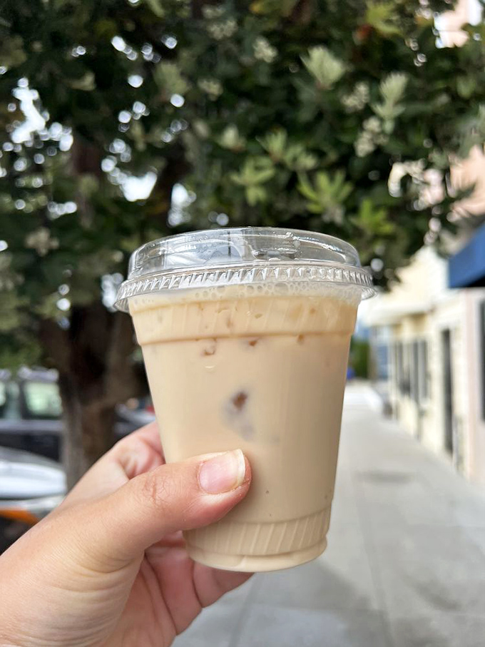 Even the iced coffee here feels special, a cool companion for your warm pastry as you stroll toward Ocean Beach.